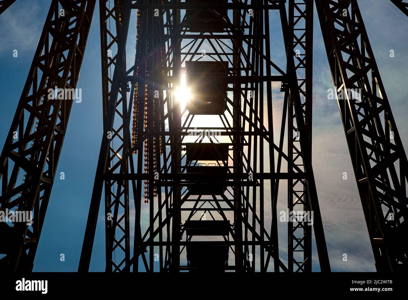 ferris wheel attraction inside view of the iron structure of the frame ...