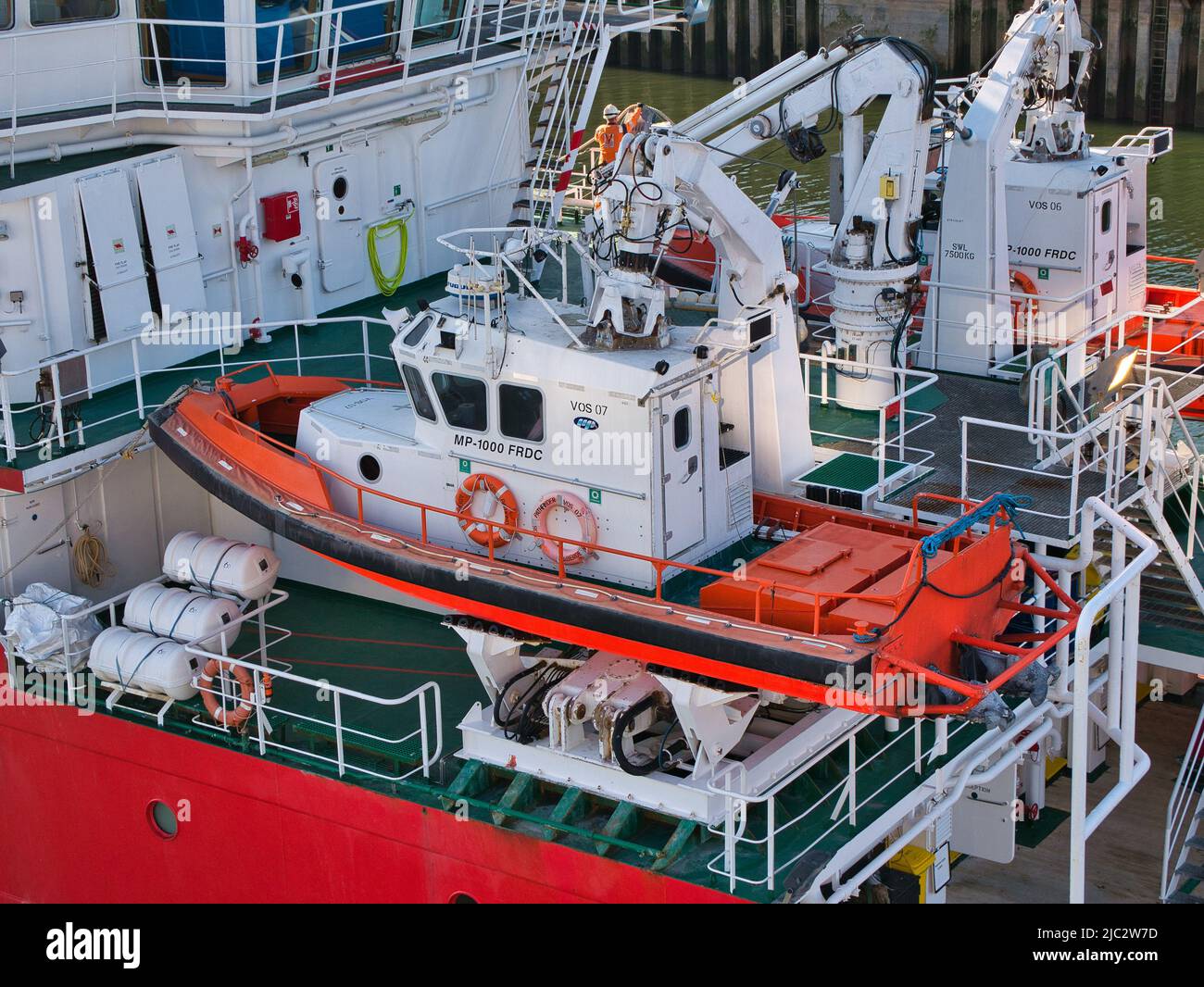 An MP-1000 Fast Rescue Daughter Craft (FRDC) with orange hull and white ...