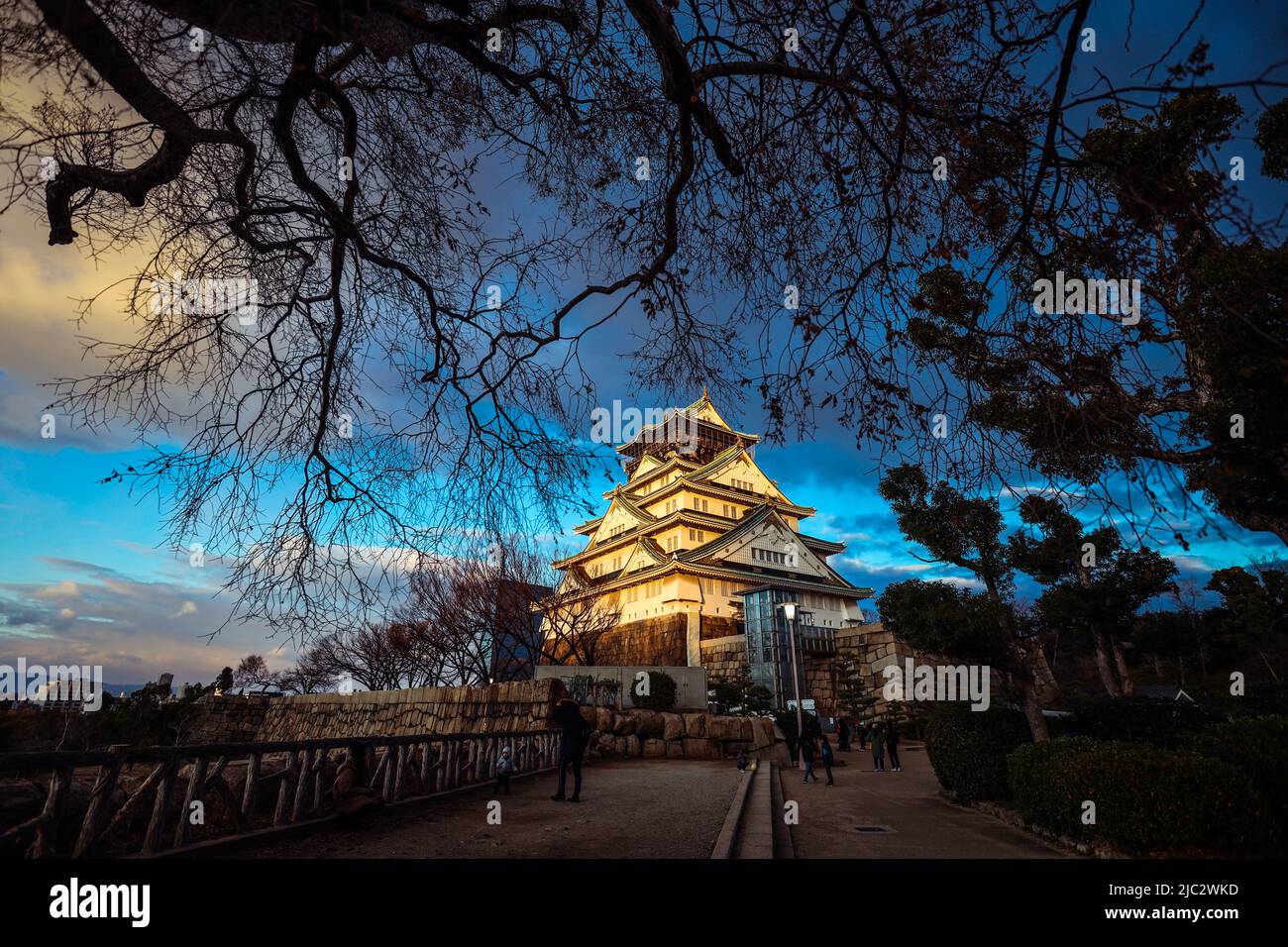 View to the Sunset Japanese Osaka Castle under Blue Sky and Trees Stock ...