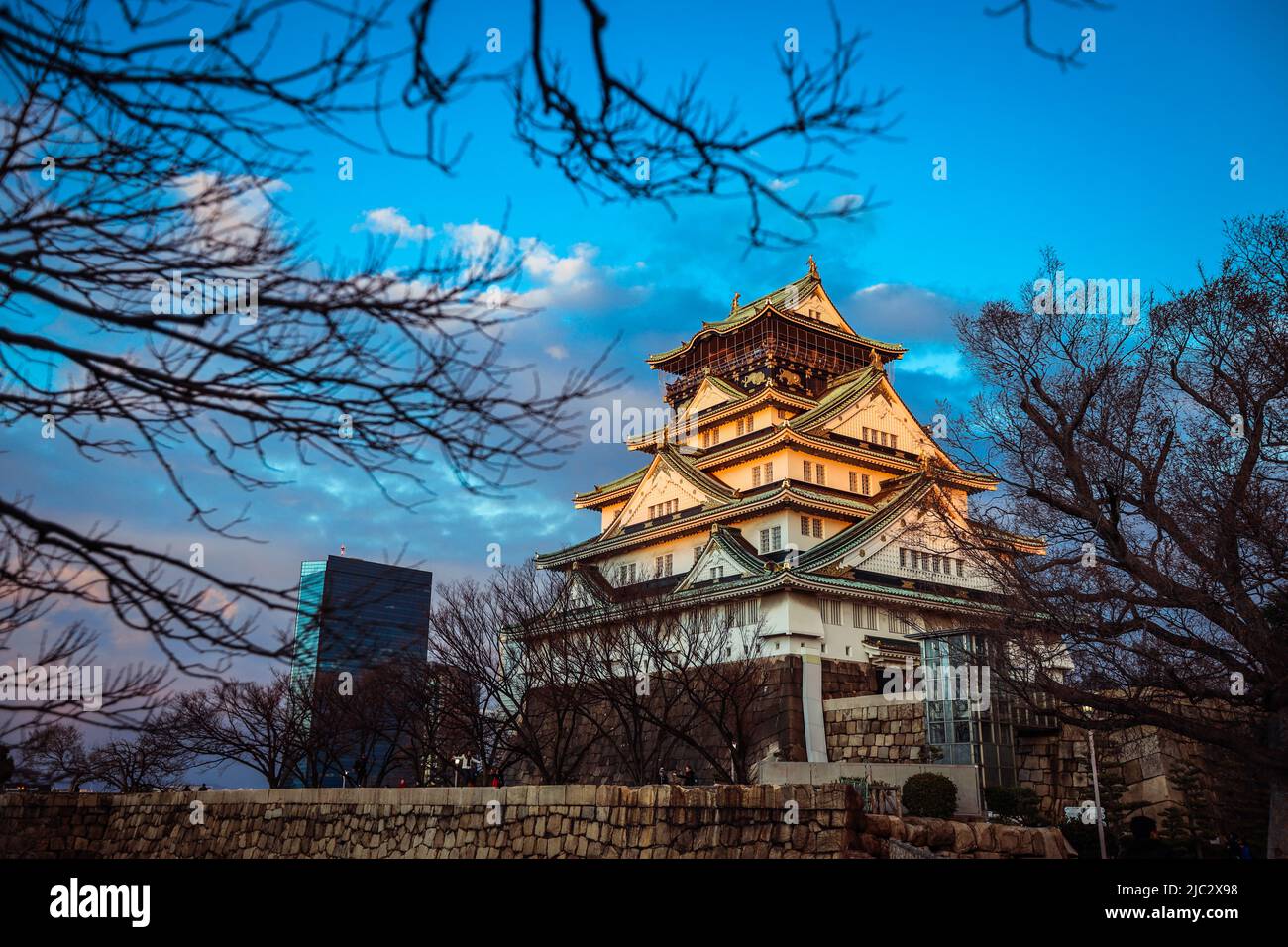 View to the Sunset Japanese Osaka Castle under Blue Sky and Trees Stock ...