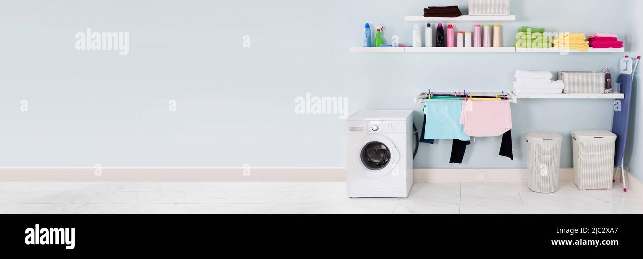 Interior Of Utility Room With Washing Machine And Cleaning Equipment ...