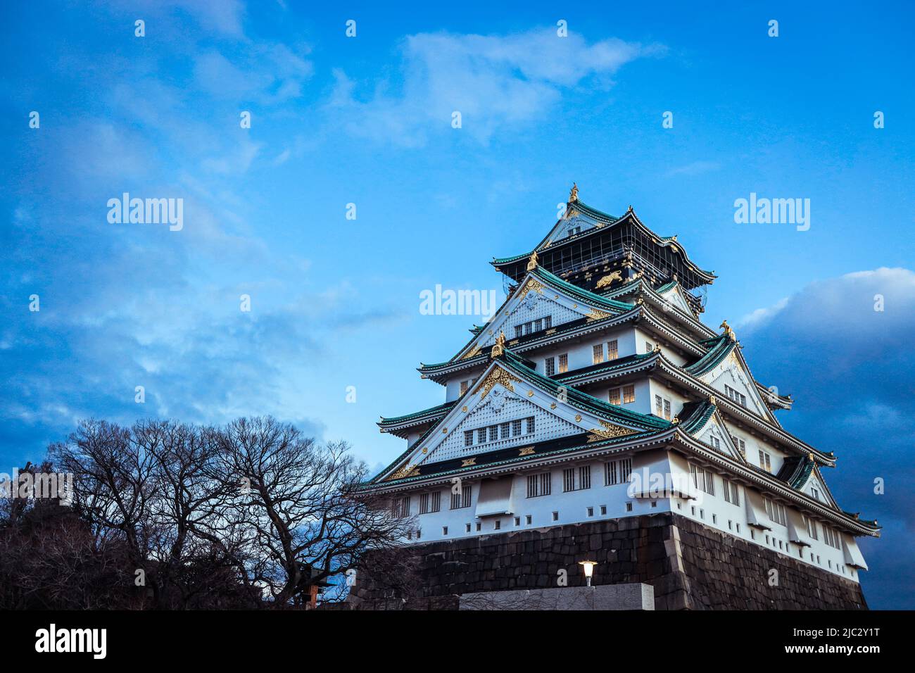 View to the Sunset Japanese Osaka Castle under Blue Sky and Trees Stock ...