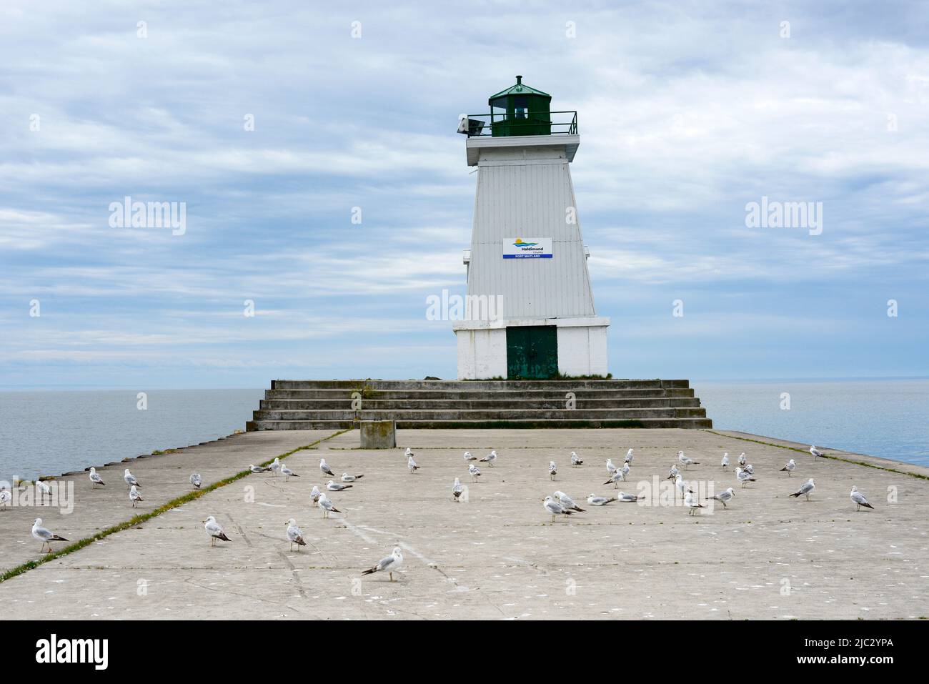 Port Maitland lighthouse and pier at the mouth of the Grand River ...
