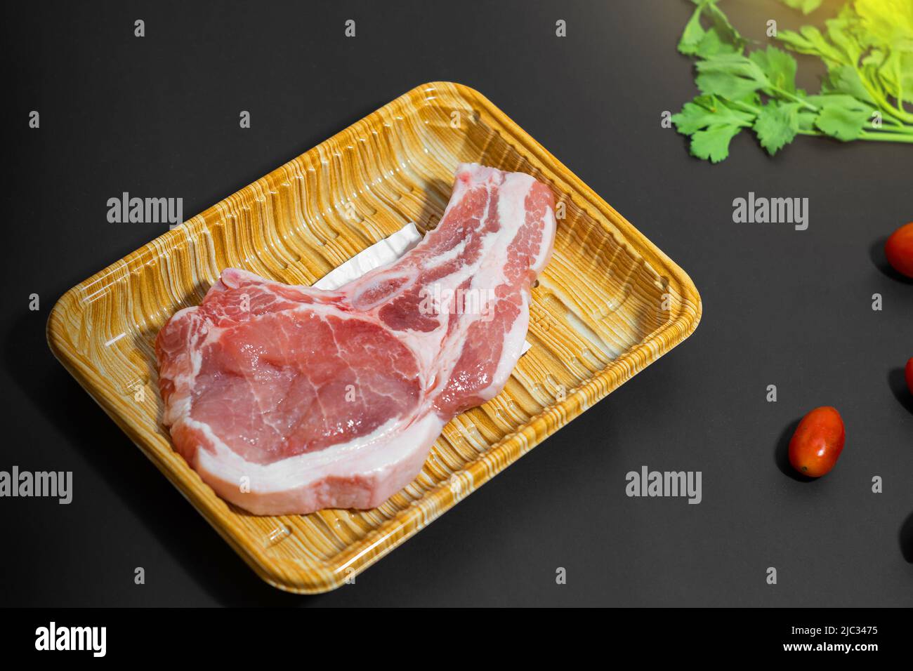 beef steak on plastic packaging with food absorbent in supermarket ...