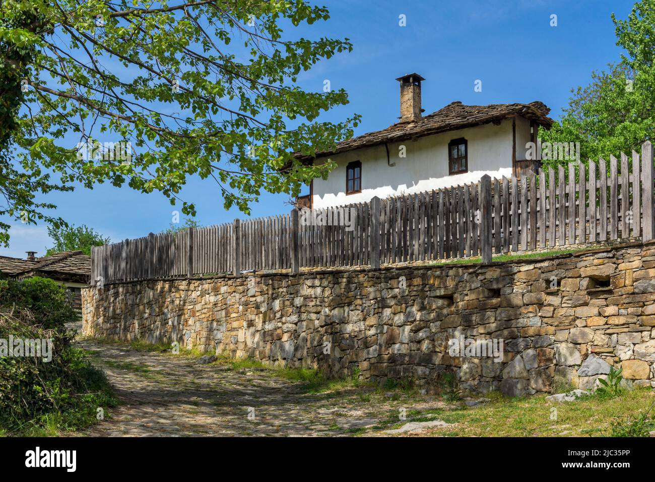 Typical street and old houses at historical village of Bozhentsi ...