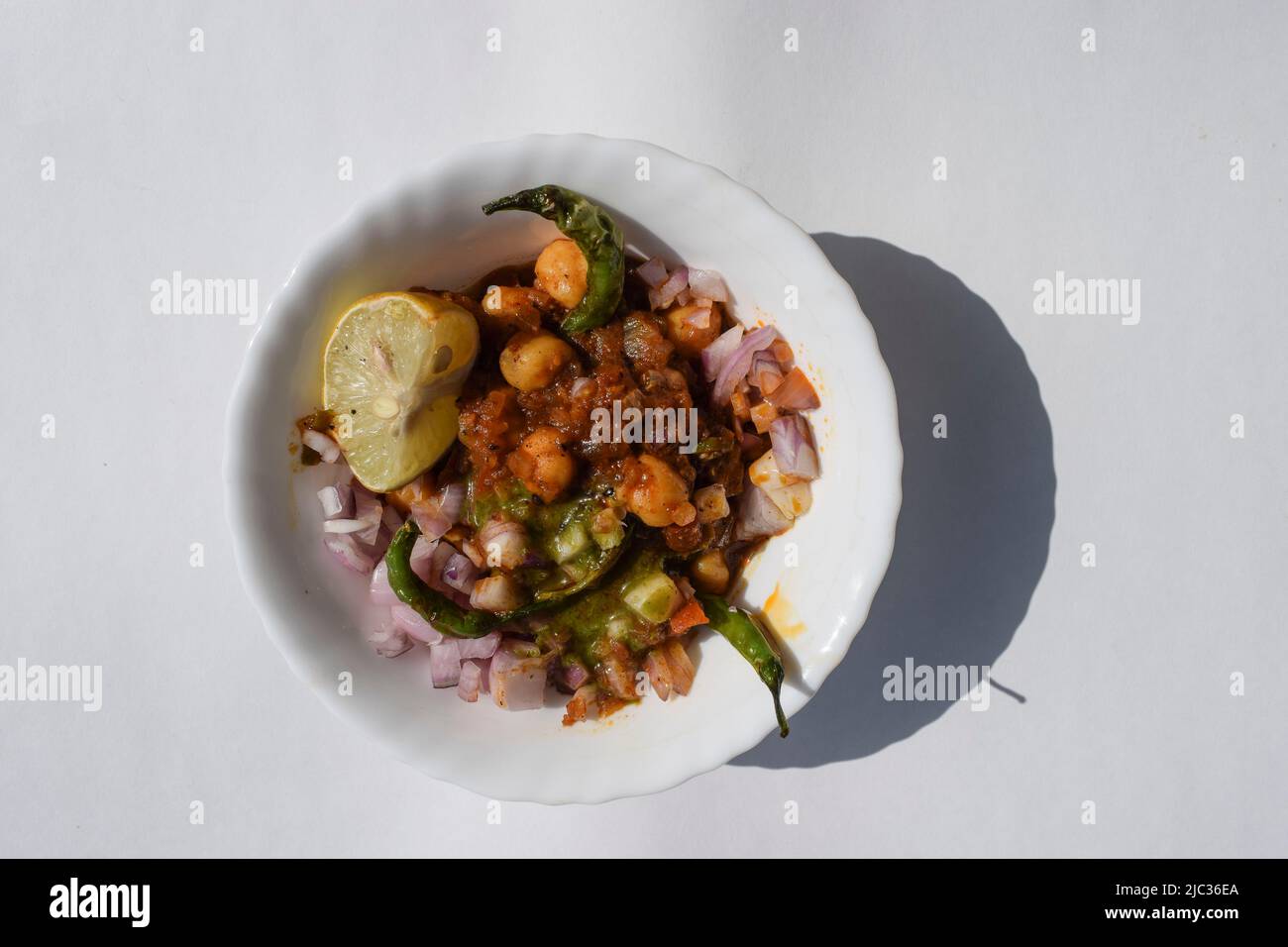 Tasty North Indian punjabi Delhi style Chhole Kulche dish. Chole made ...