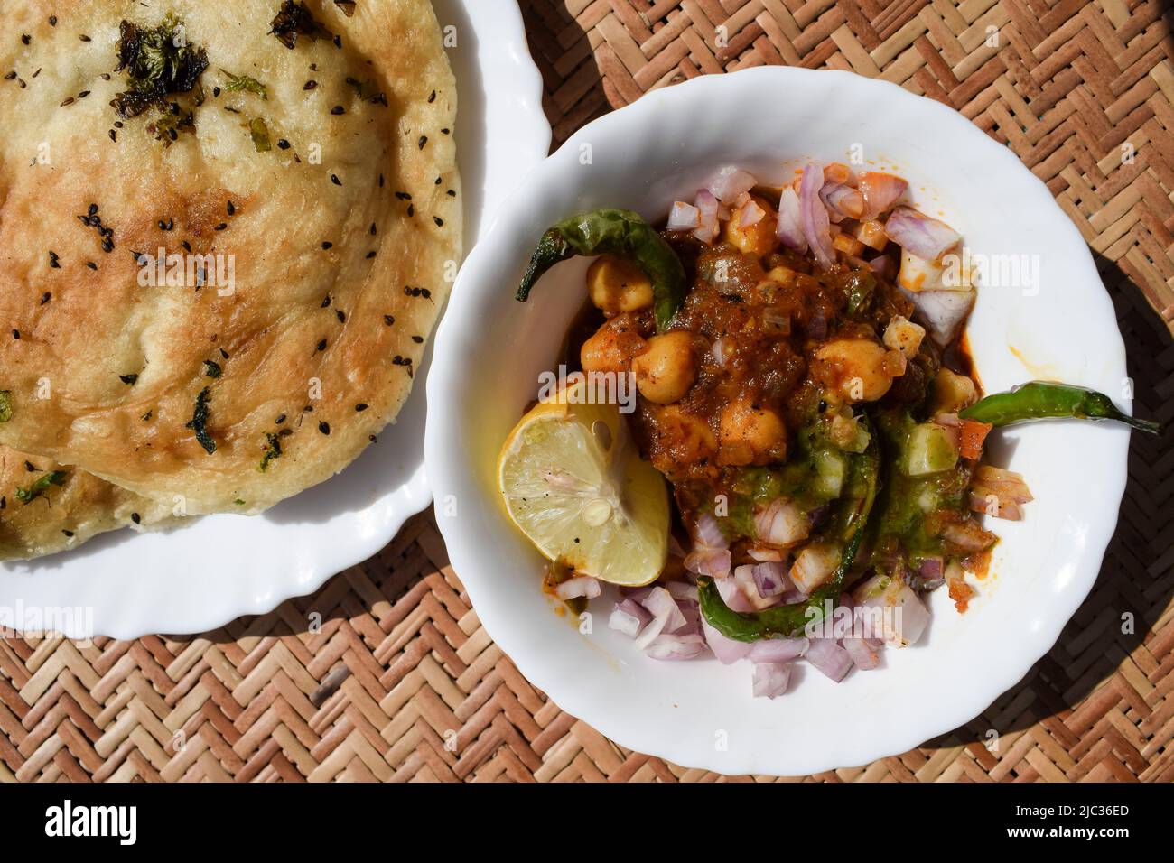 Tasty North Indian punjabi Delhi style Chhole Kulche dish. Chole made ...