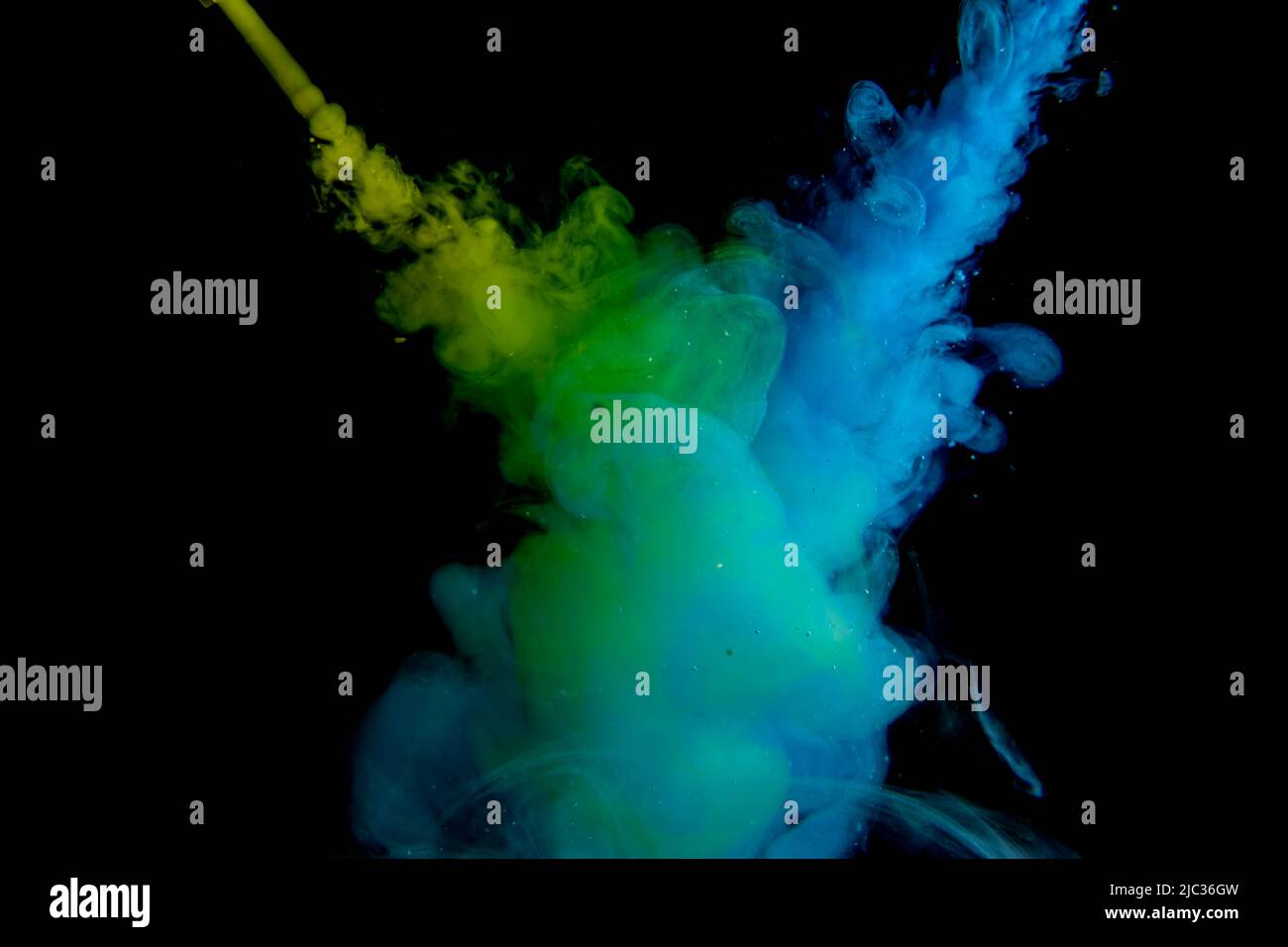 Color drop in water isolated on white background Stock Photo - Alamy