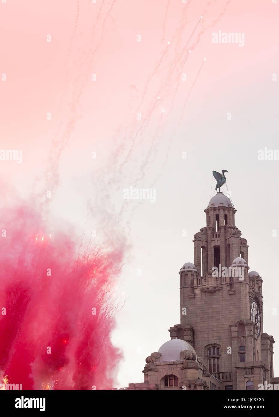 Royal Liver Building, red flares, smoke and fireworks during victory ...