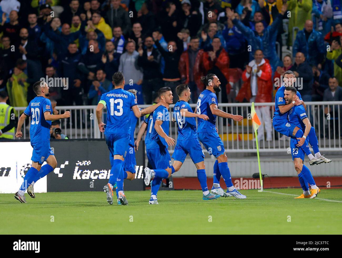 Kosovo's Zymer Bytyqi celebrates with his team-mates after scoring ...