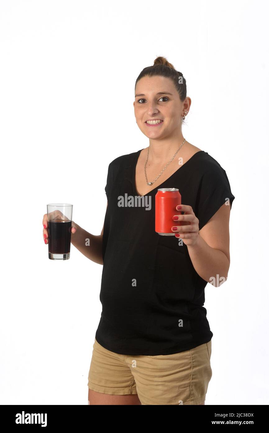 woman holding a glass of coke soda on white background Stock Photo - Alamy