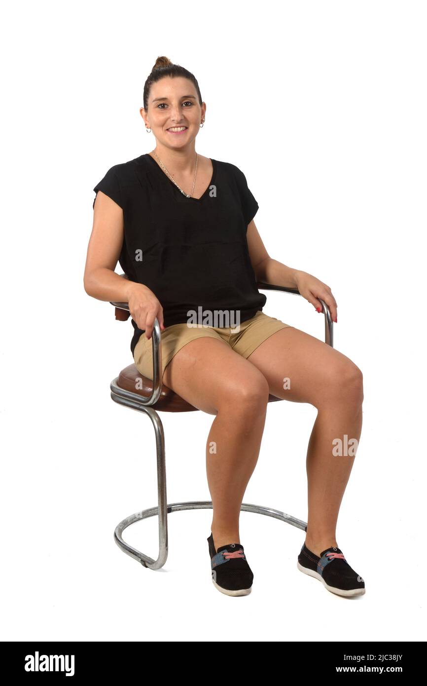 full portrat of a woman sitting on chair on white background Stock ...