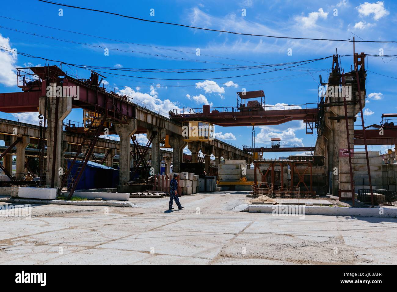 Territory of reinforced concrete factory Stock Photo - Alamy
