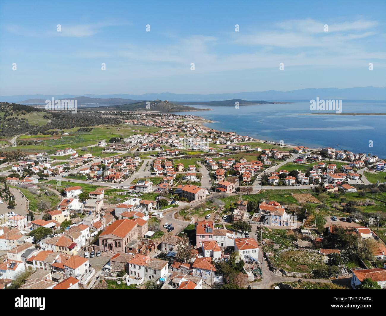 Ayvalik. Aerial view of tourist city Ayvalik in Turkey. Houses with red ...