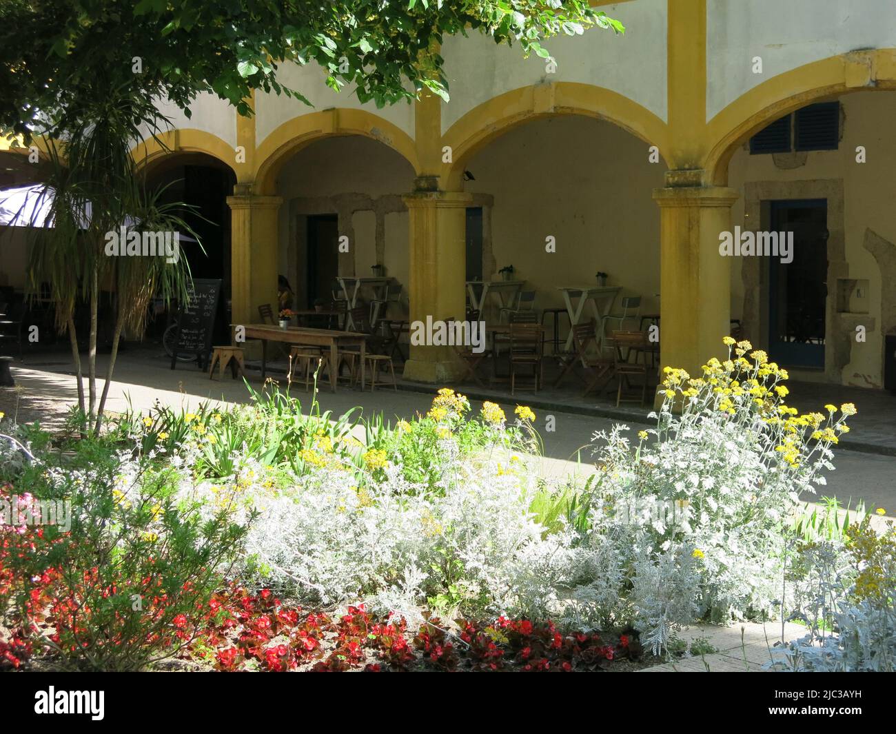 After painting the garden & distinctive yellow arches at the hospital ...