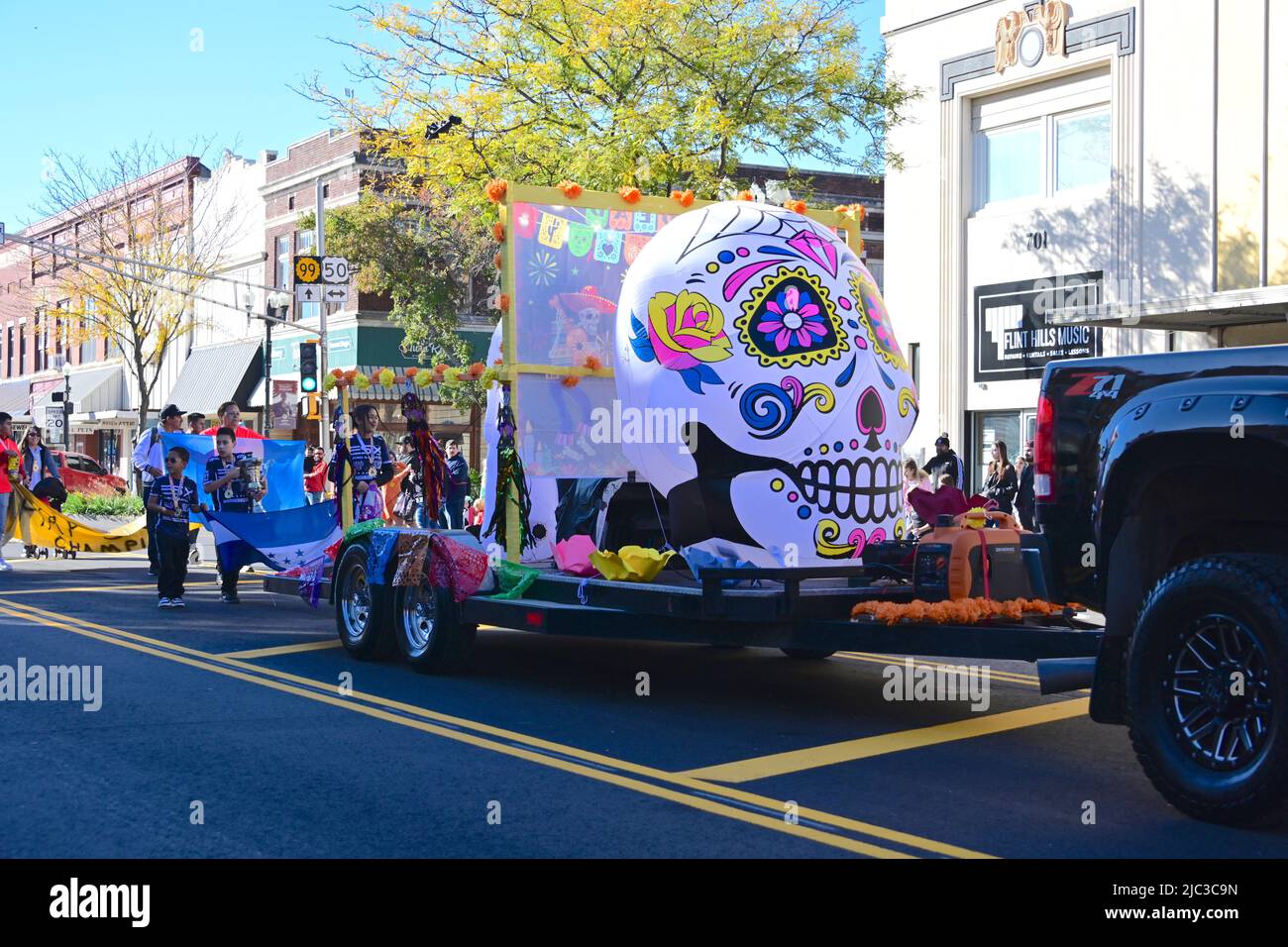 EMPORIA, KANSAS - OCTOBER 30, 2021 Local Hispanics riding on floats ...