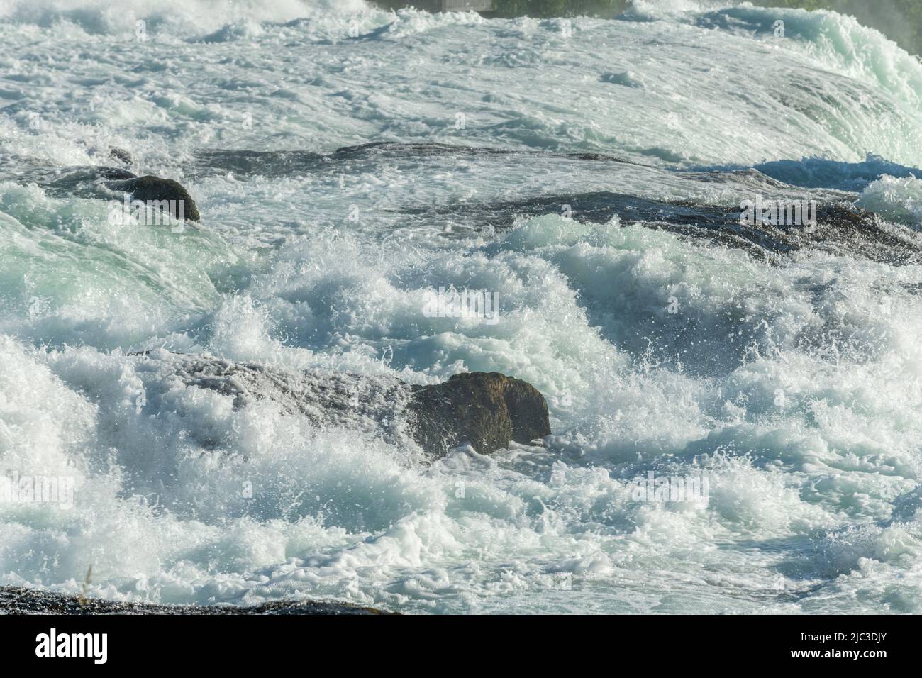 Fast currents in Rhine Falls in spring. Neuhausen am reinfall ...
