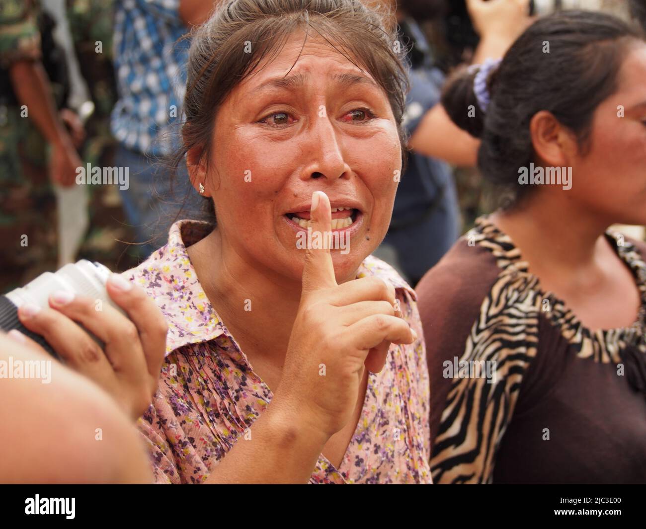 woman crying when Police is targeting protesters with a pepper gas ...