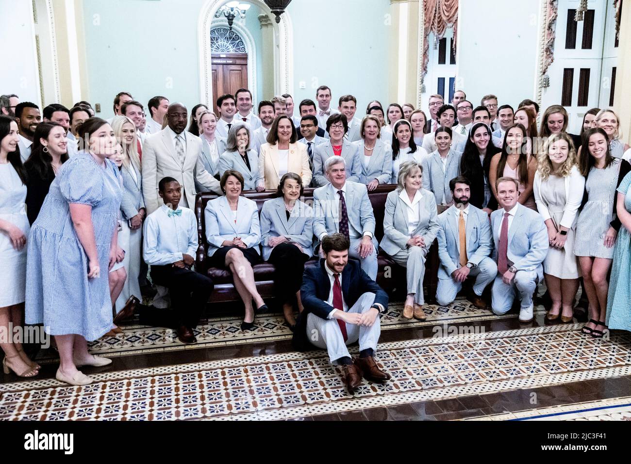 Senators and staff pose for a seersucker Thursday photo outside the ...
