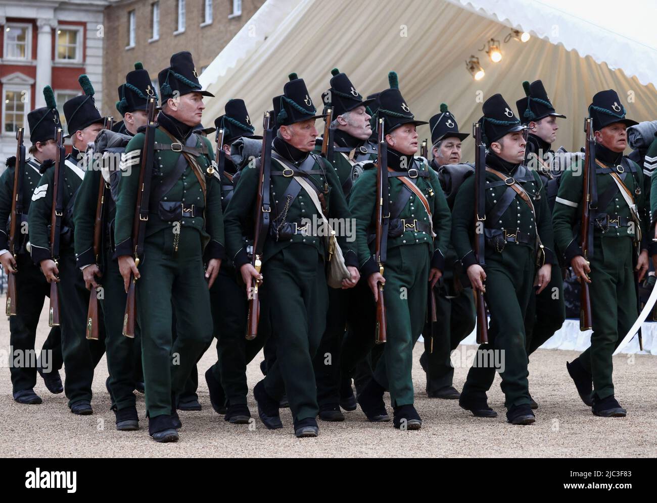 Military reenactors wearing 95th rifles historic uniforms perform ...