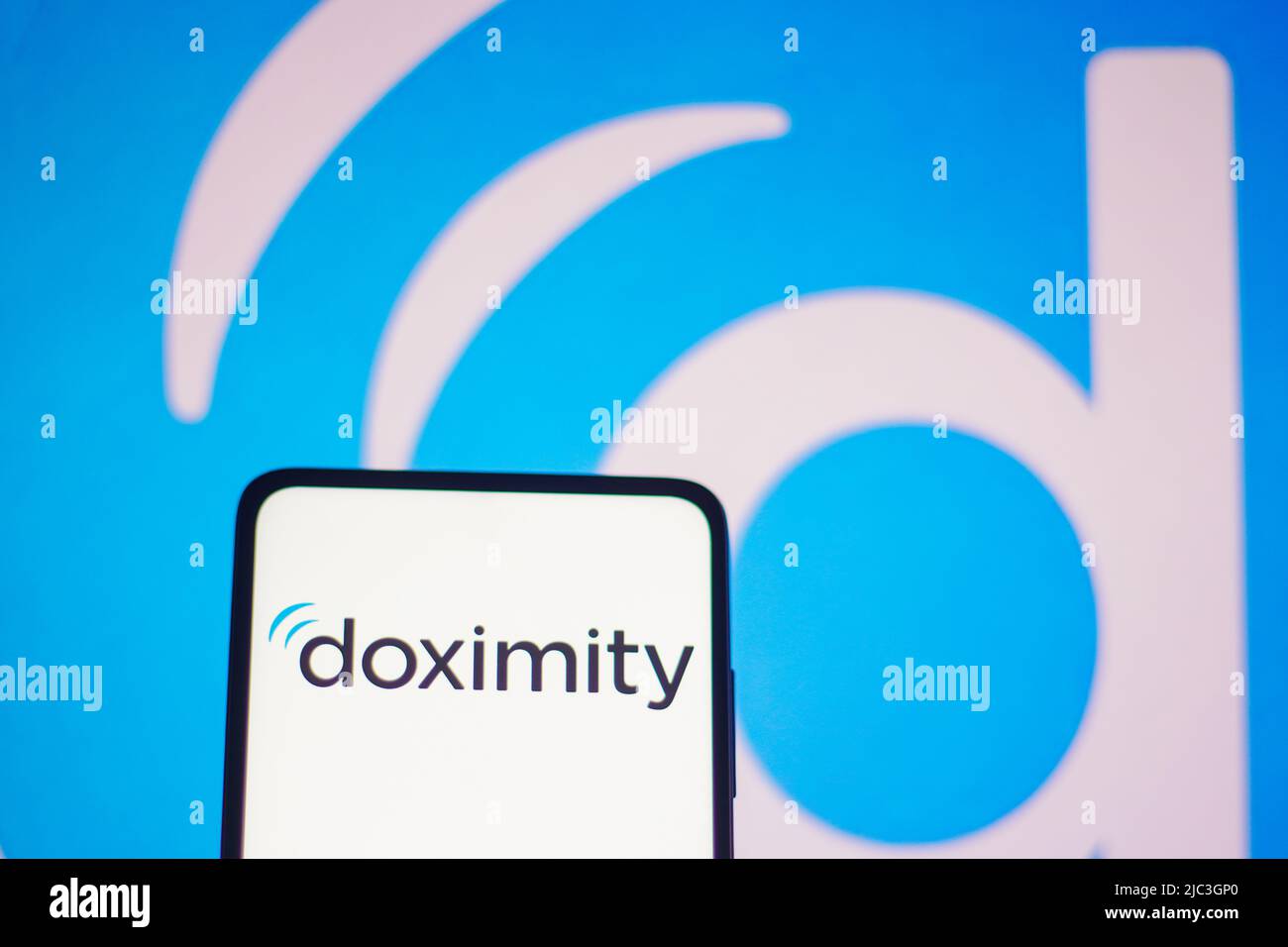 In this photo illustration, the Doximity logo is displayed on a ...