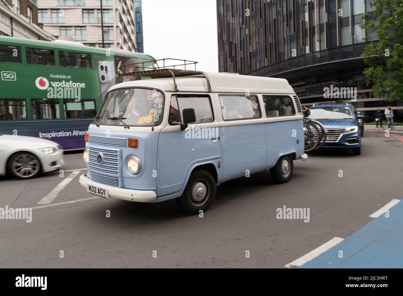vw camper van is on road among other traffic in London England UK Stock ...