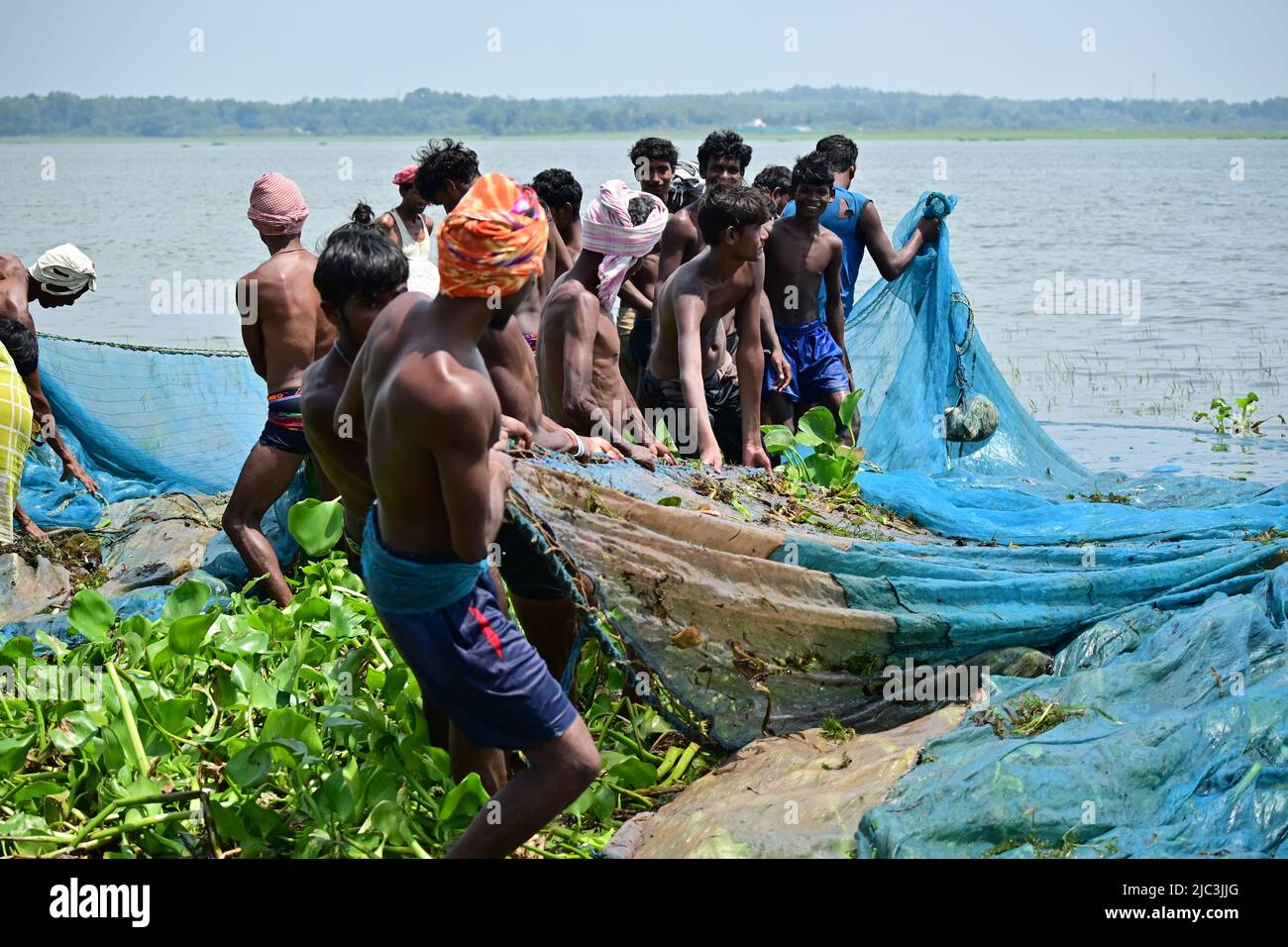 group fishing with net in the river Stock Photo - Alamy