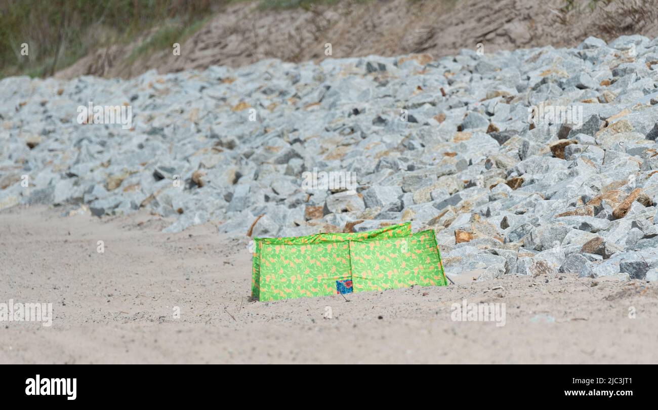 A beach screen with no people. The beginning of the holiday season at ...