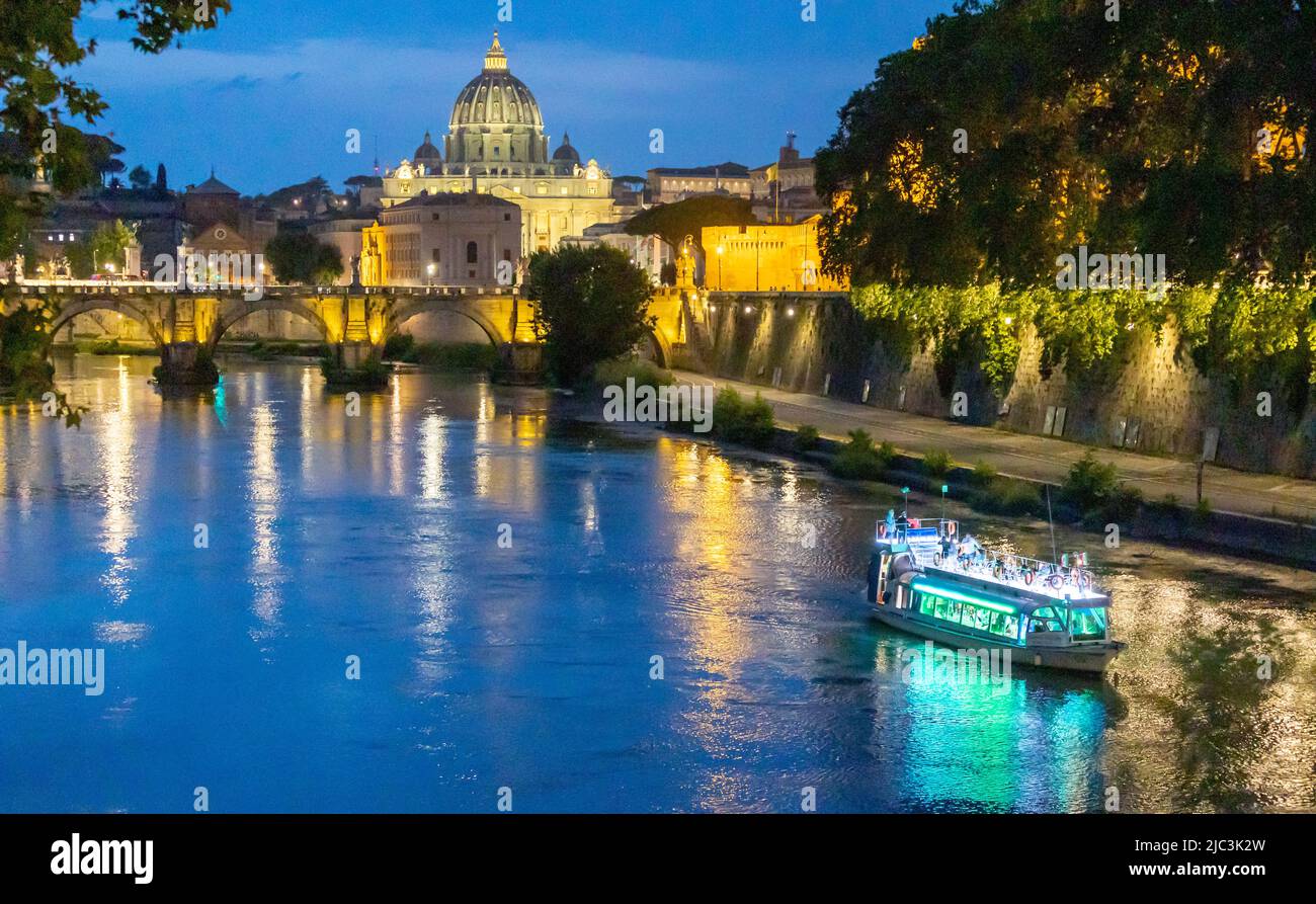 Saint Peter dome with a boat on the Tiber river at sunset Stock Photo ...