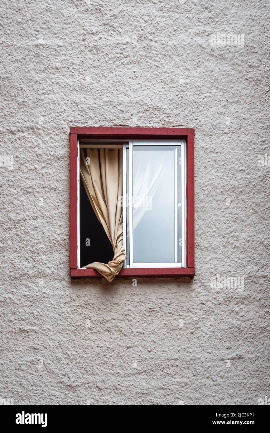 Small Open Window with a Red Frame and a Yellow Curtain on the Inside ...