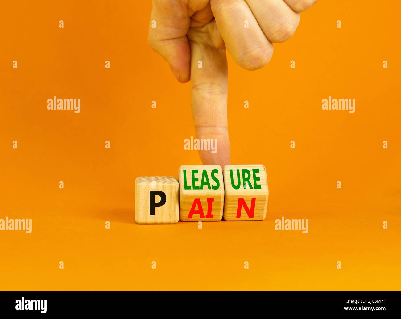 Pain or pleasure symbol. Concept words Pain or Pleasure on wooden cubes ...