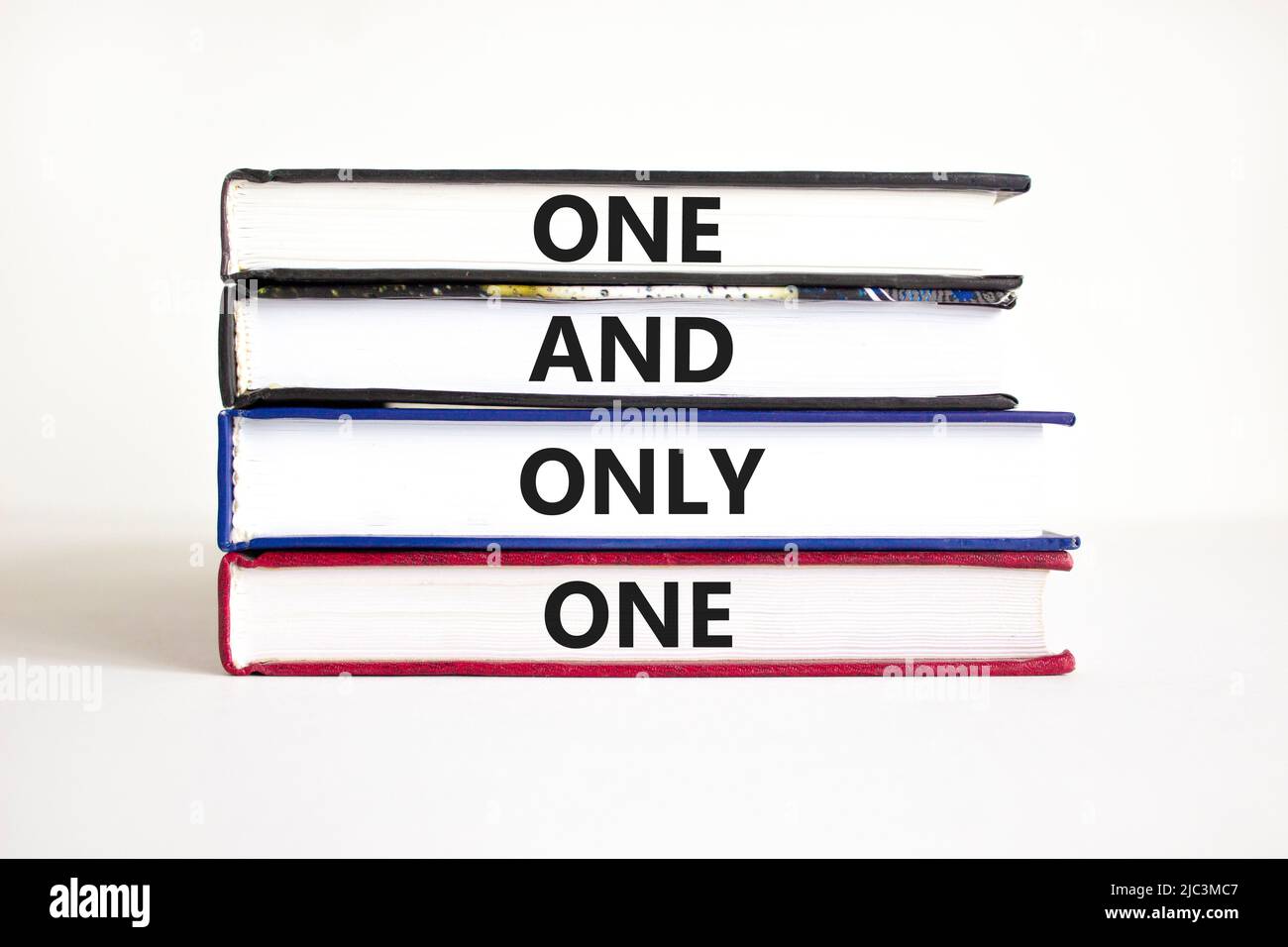 One And Only One Symbol Concept Words One And Only One On Books On A Beautiful White Table