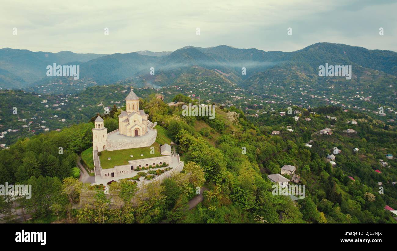 awesome aerial shot of Sameba Holy Trinity Cathedral Church, green and ...