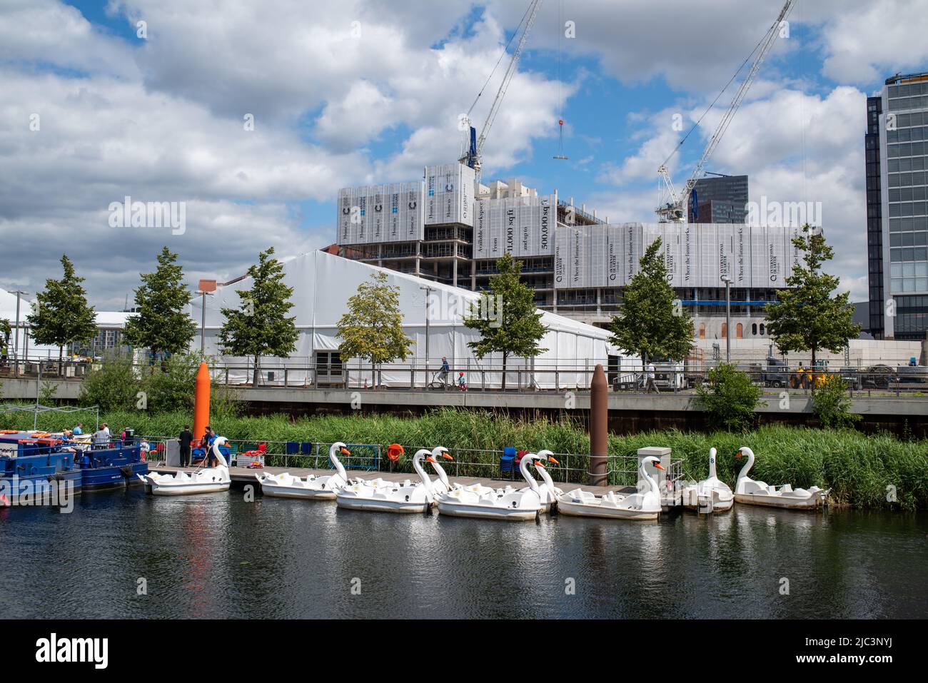 Swan boats on the canal near Olympia Stock Photo - Alamy