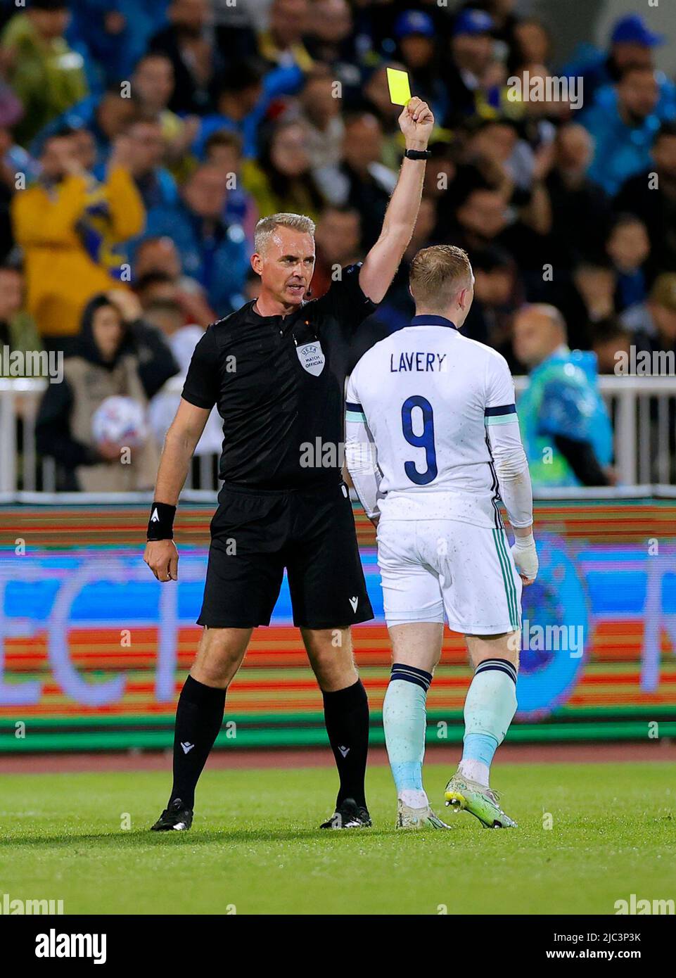 Northern Ireland's Shayne Lavery is shown a yellow card during the UEFA ...