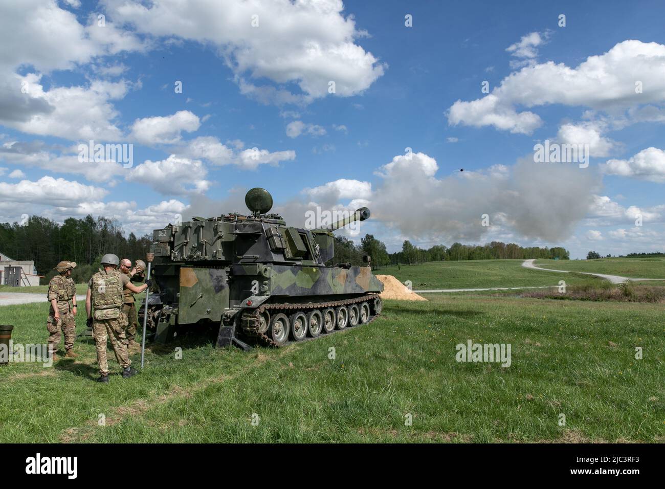 Ukrainian artillerymen fire the M109 self-propelled howitzer during training at Grafenwoehr ...