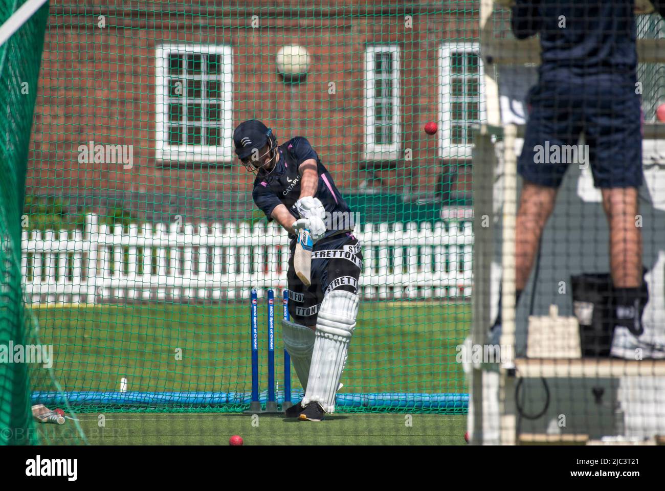 Toby Roland-Jones smashes the ball in the nets during a Middlesex ...