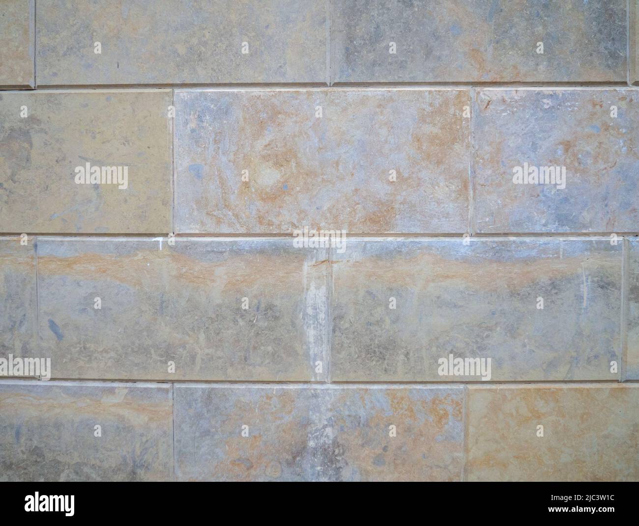 Masonry. A wall of solid material. Concrete. Smooth surface Stock Photo ...