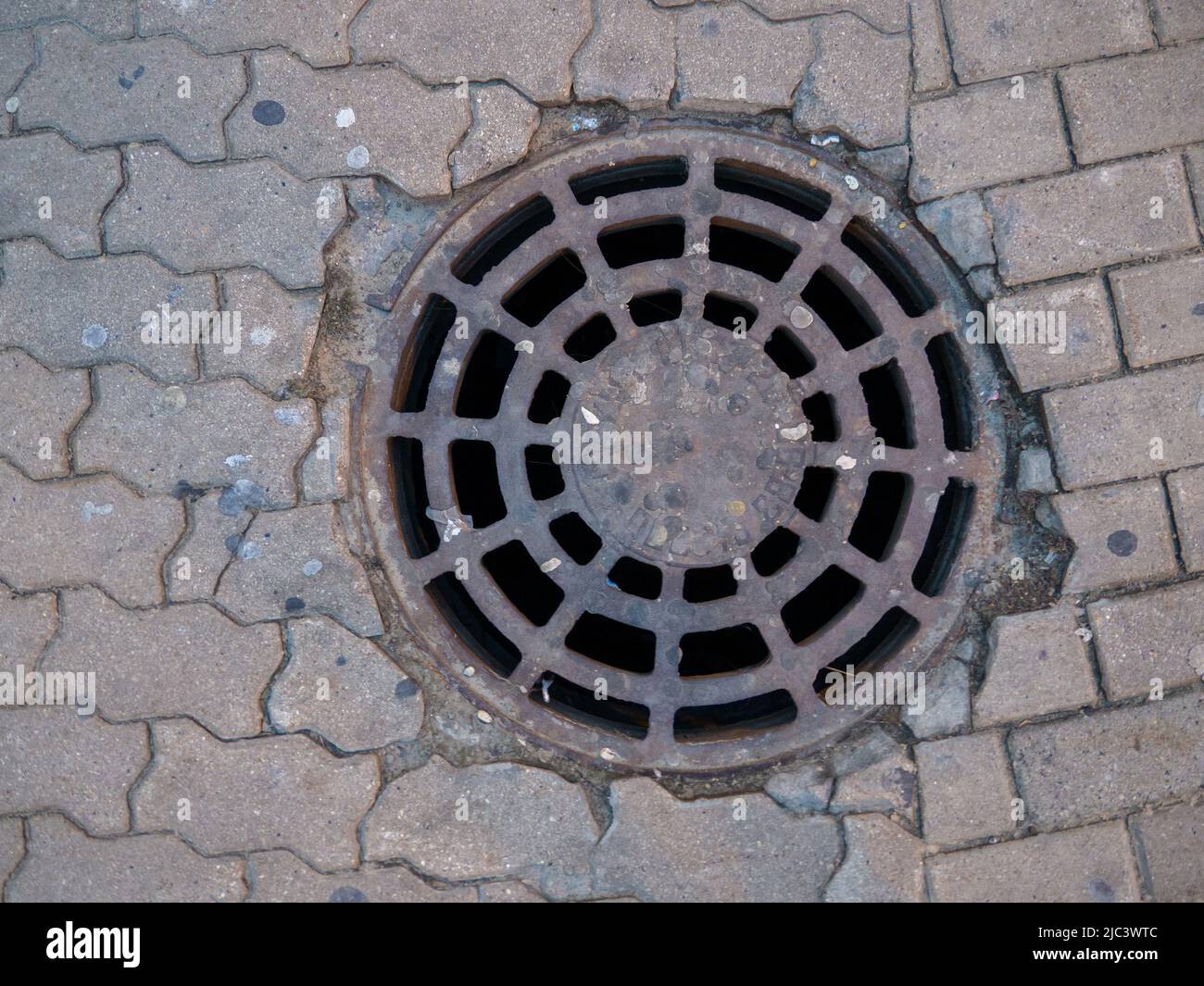 old manhole in the grass. Sewer entrance . Communications Stock Photo ...