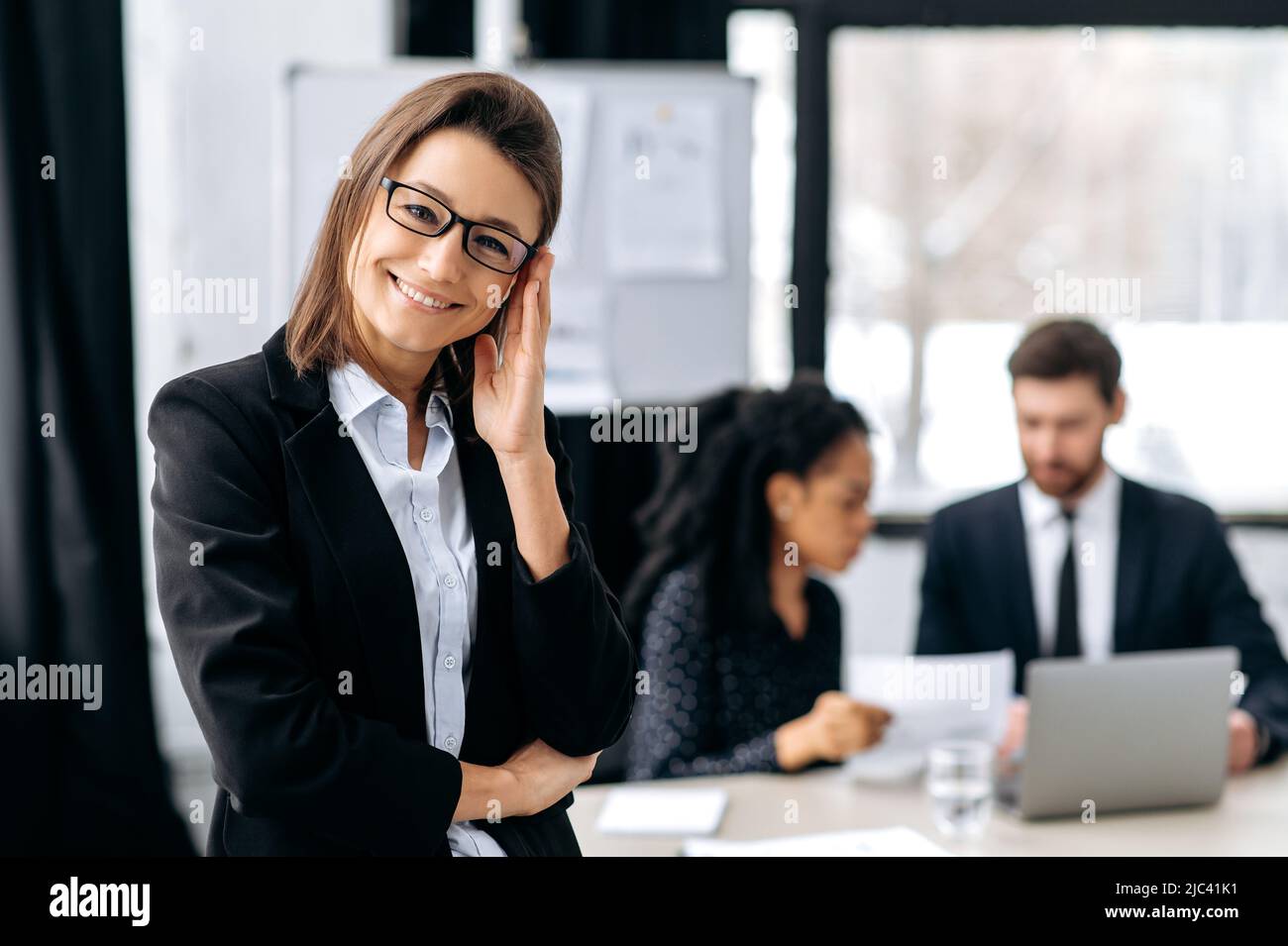 Positive confident elegant gorgeous caucasian business woman with ...