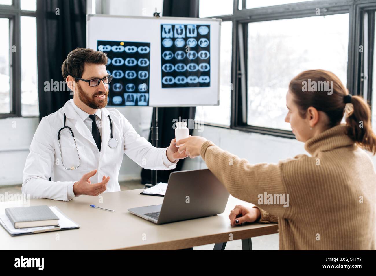Smiling patient receiving medical hi-res stock photography and images ...