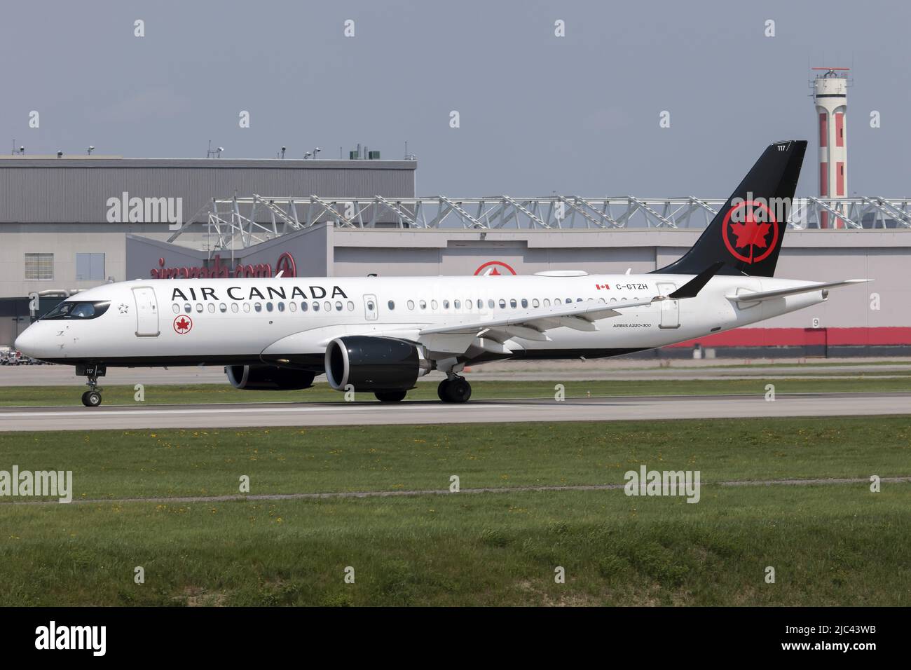 An Air Canada Airbus 220-300 landing at Montreal Pierre Elliott Trudeau ...