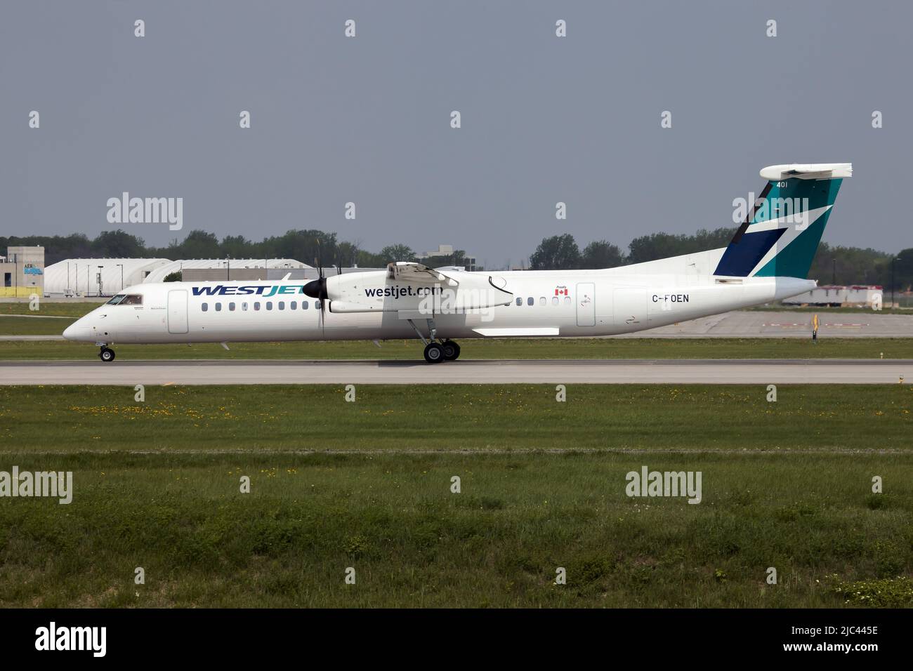 A WestJet Encore Bombardier Dash 8-Q400 just landed at Montreal Pierre ...
