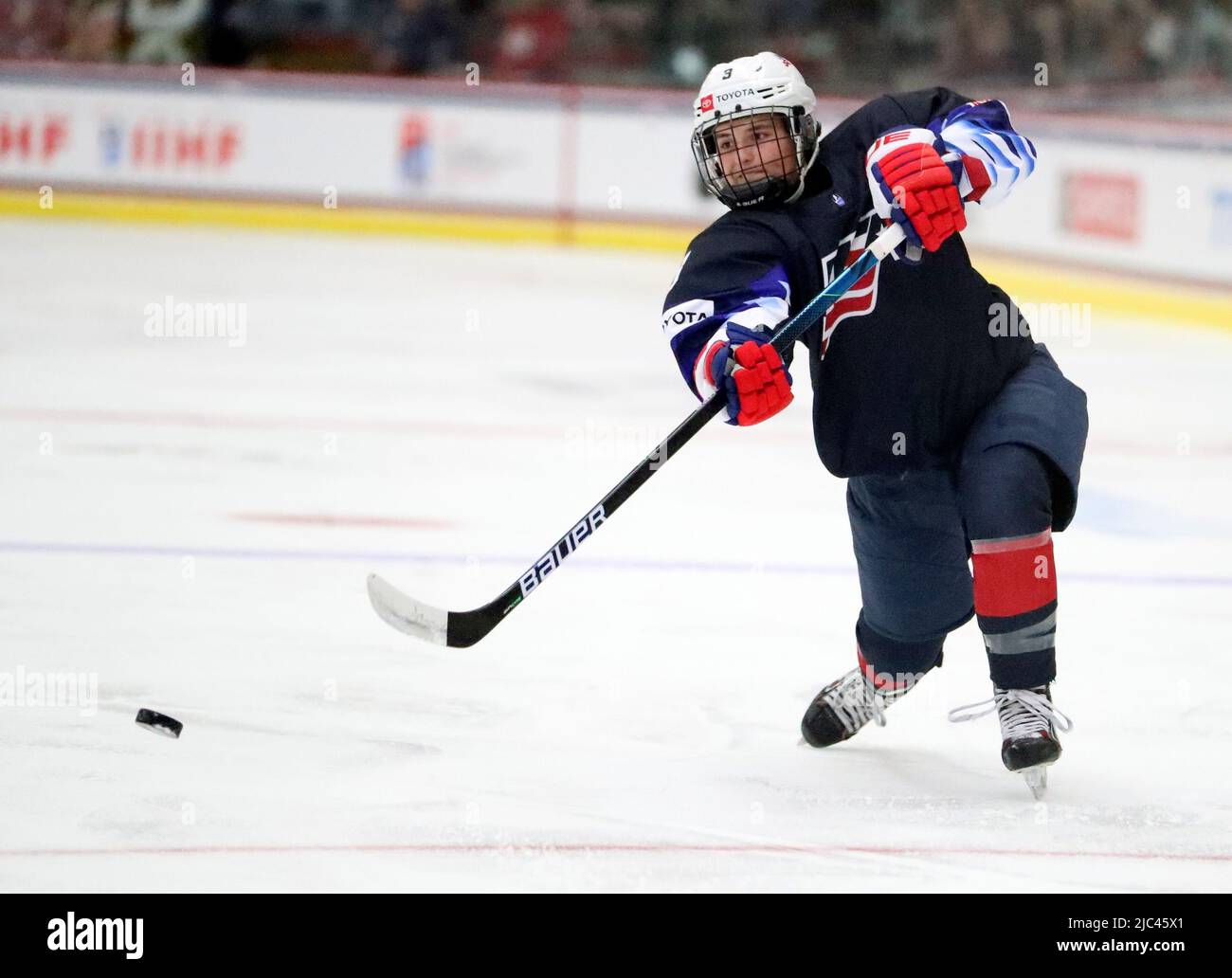 June 9, 2022 - Jenessa Gazdik of the United States shoots the puck ...