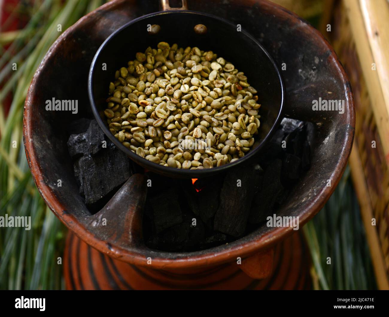 Roasting coffee beans in a traditional Ethiopian coffee ceremony Stock Photo - Alamy