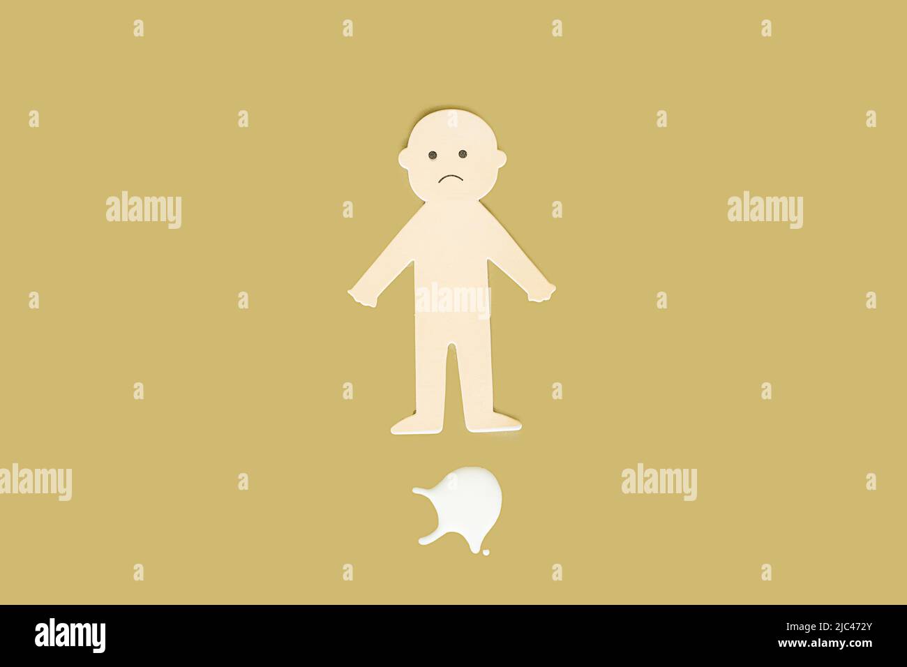 Photo of urinary incontinence concept, sad paper cut person and puddle ...