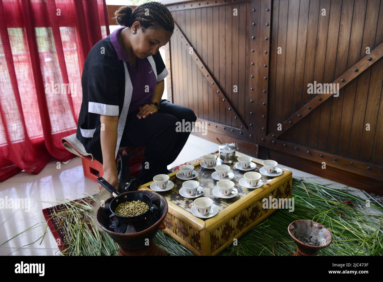 Roasting coffee beans in a traditional Ethiopian coffee ceremony Stock Photo - Alamy