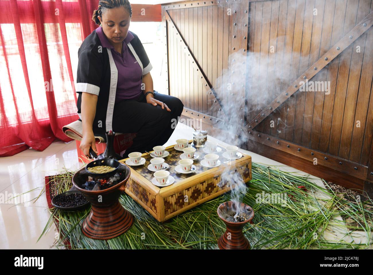 Roasting coffee beans in a traditional Ethiopian coffee ceremony Stock Photo - Alamy