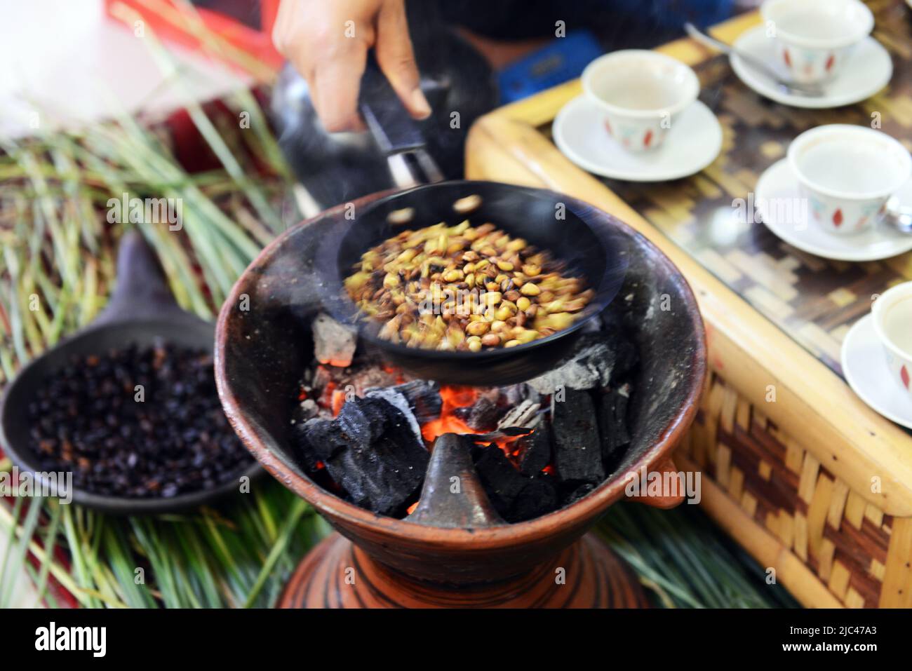 Roasting coffee beans in a traditional Ethiopian coffee ceremony Stock ...
