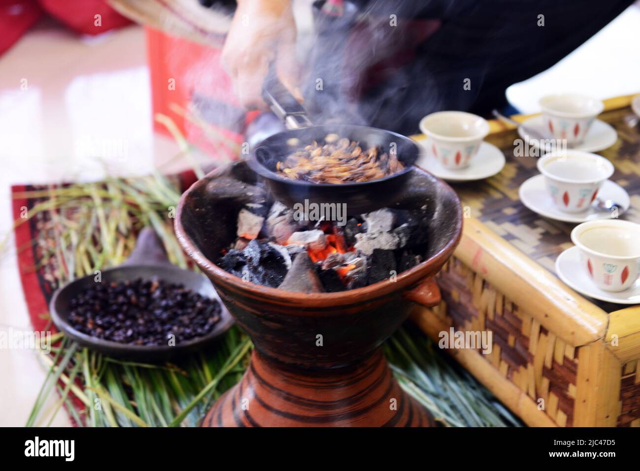 Roasting coffee beans in a traditional Ethiopian coffee ceremony Stock ...